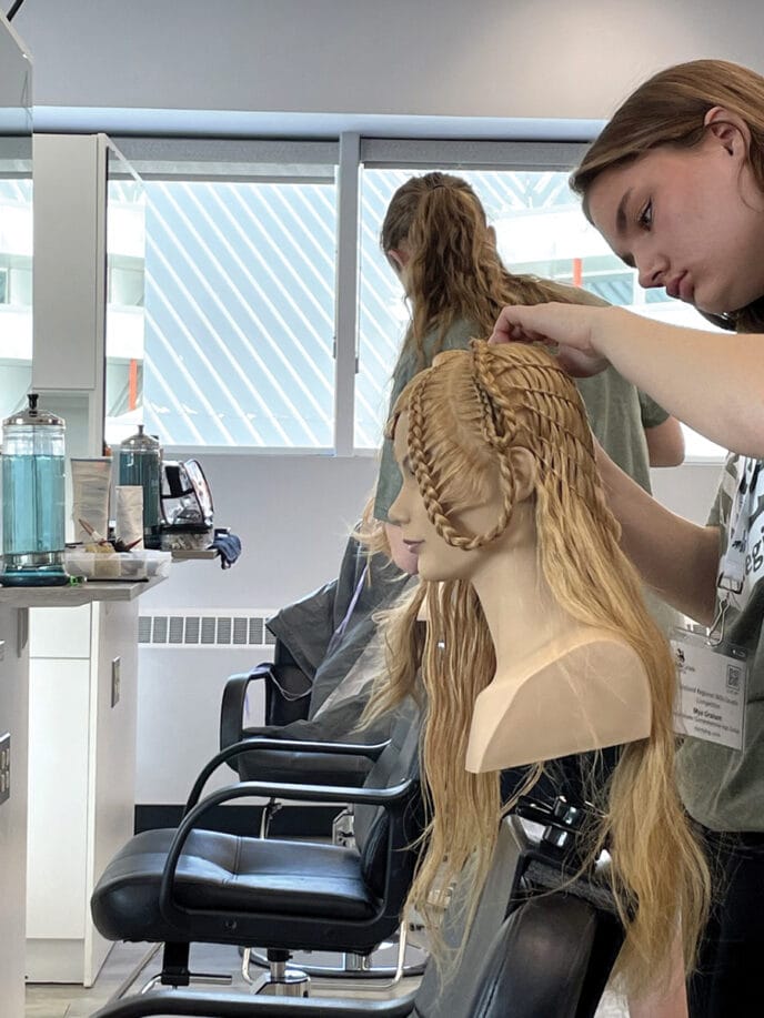 Braidy bunch and updo girls medal | Meridian Source